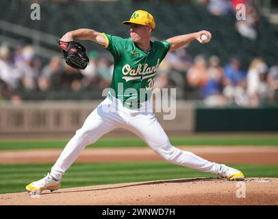 Athletics' J.P. Sears pitches during the first inning of a baseball ...