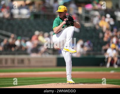 Athletics starting pitcher JP Sears pitches to Houston Astros' Isaac ...