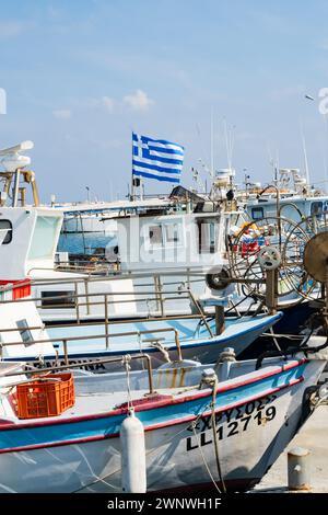 Traditional Cypriot small fishing boats moored in the fishing harbour ...