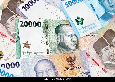 Background image of many indonesian rupiah money bills of new series ...