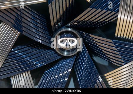 Infinity led light logo in the rim wheel of a car Stock Photo - Alamy