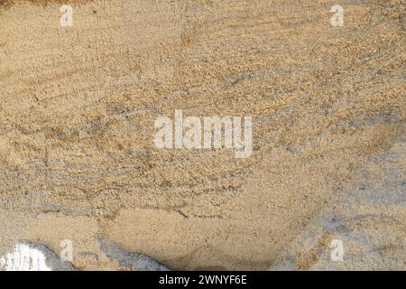 Sandstone is a fragmentary sedimentary rock, a homogeneous or layered ...