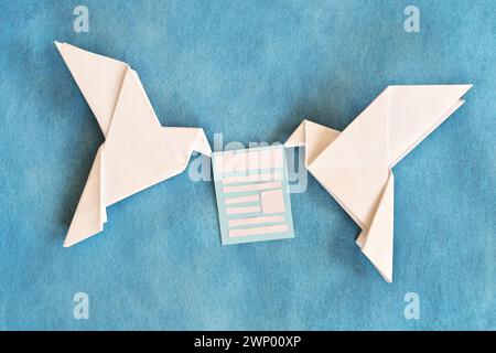 Two paper dove origami carrying letter envelope. Receiving email such ...