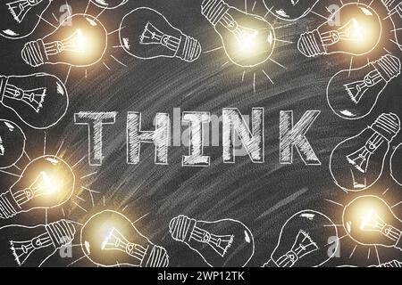 Shining light bulbs with lettering BRAINSTORM hand drawn in chalk on ...