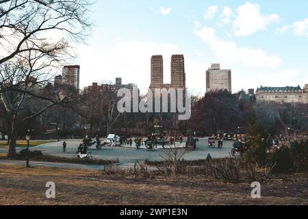 Small park with big city skyscrapers in the background on a brigth day ...