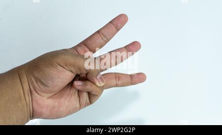 Hand with three fingers pose isolated on white background Stock Photo ...