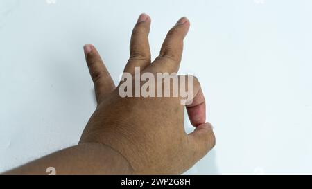 Hand with three fingers pose, giving OK sign isolated on white ...