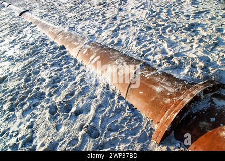 Pipework on a beach Stock Photo - Alamy