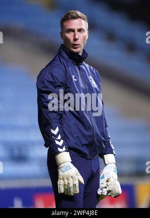 Coventry City goalkeeper Simon Moore with sponsors at Coventry Building ...
