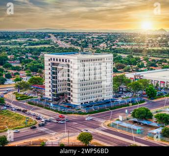 aerial view CBD , Gaborone, Botswana, intersection and cars, at sunset ...