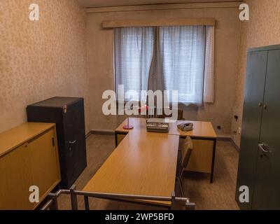 Interrogation room in the former Cold War Stasi prison Hohenschönhausen ...