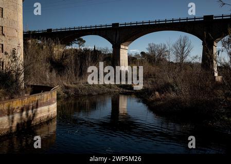 The Fluvia river as it passes by Sant Miquel de Fluvia, in north ...