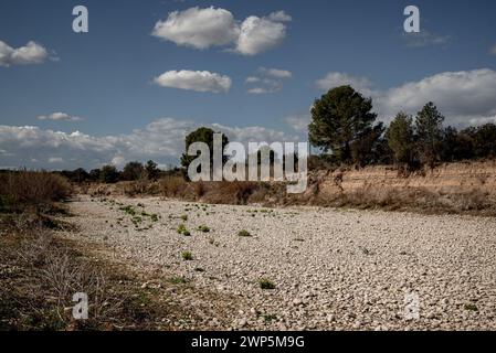 The dry riverbed of the Fluvia river as it passes by Sant Miquel de ...