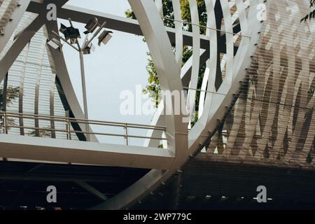 Modern overhead pedestrian tunnel metal air bridge exterior in city ...