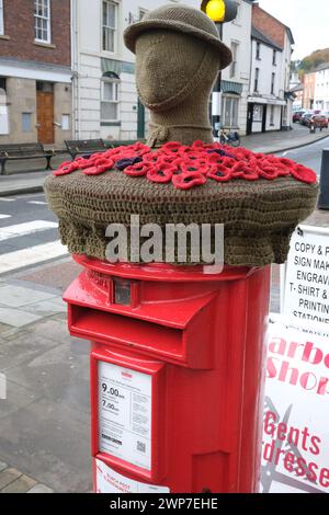Red Royal Mail Postbox Decorated with a Crochet Green Solider head and ...