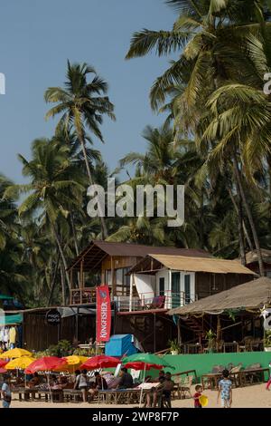 The buildings on a sandy beach of Goa in India Stock Photo - Alamy