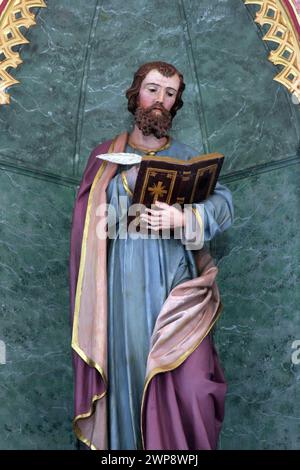 Saint Luke statue on the altar of the Holy Three Kings in the parish ...