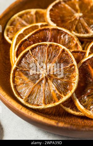 Dehydrated Dry Lemon Slices in a Bowl Stock Photo - Alamy