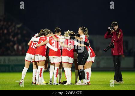 Arsenal players form a huddle ahead of the Premier League match at the ...