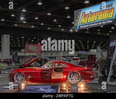 Old red Chevrolet Chevy Corvair Monza coupe 1963 in a warehouse. Front ...
