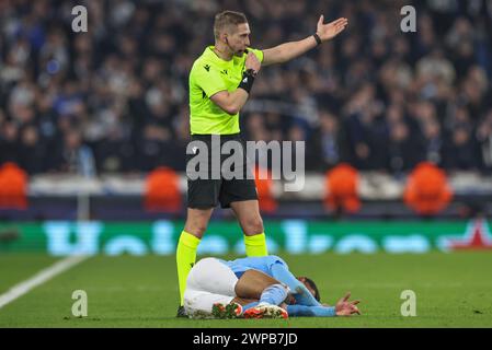 Matheus Nunes of Manchester City goes down injured with a finger injury ...