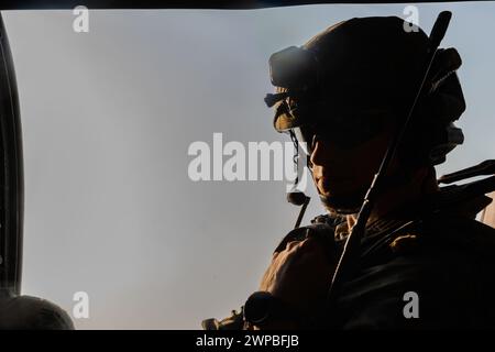 A German soldier with the 6th Battery, 345th Artillery Battalion, rides ...