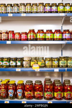 Russian goods store shelves have wide range of canned semi-finished ...