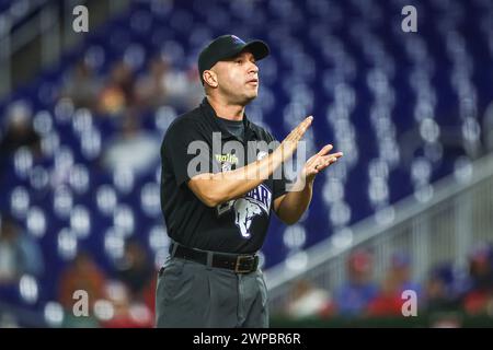 MIAMI, FLORIDA - FEBRUARY 1: ampayer, umpire during a game between ...
