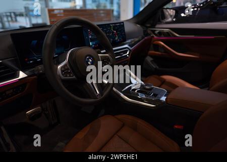 Interior, steering wheel, center console BMW i4 five-door electric ...