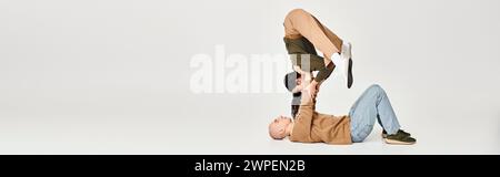 Balance - two acrobats balancing on each other. Man balances woman ...