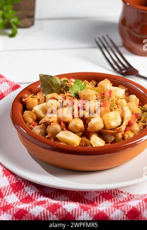 Homemade Ropa vieja, typical Canarian dish of chickpeas stew with ...