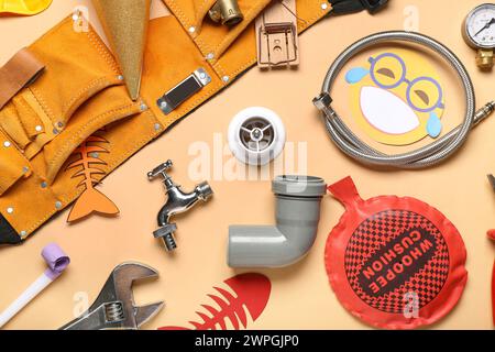 Construction tools with whoopee cushion, mousetrap and party decor on ...