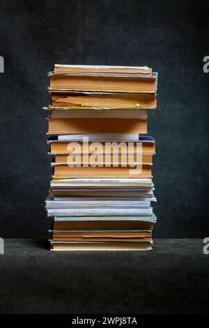 A stack of old books and notebooks on the table Stock Photo - Alamy