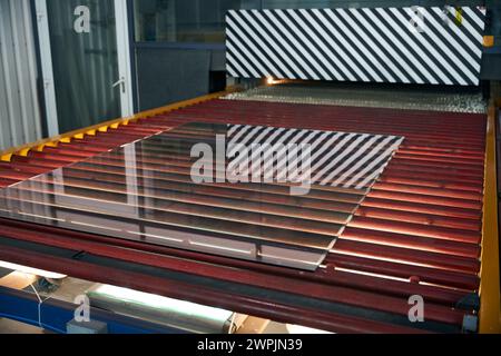 Process of glass tempering using thermal equipment Stock Photo - Alamy