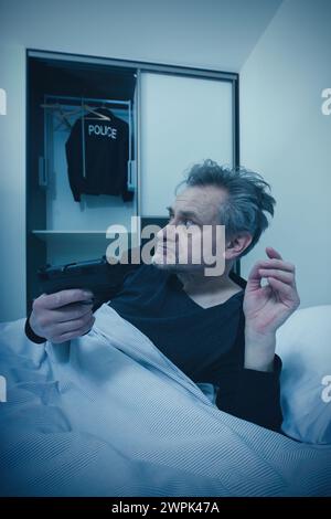 Police officer waking up in his bedroom afraid of intruder Stock Photo ...