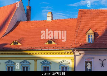 Roofs with windows like eyes, typical architecture of Sibiu ...