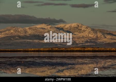View across the Duddon Estuary towards the Coniston mountain range and ...