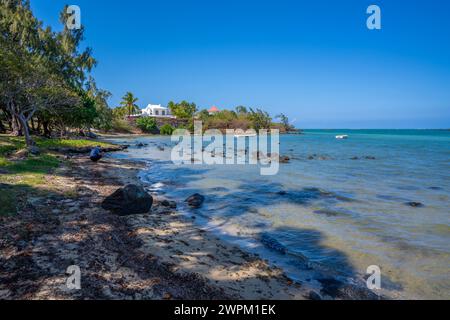 View of Anse La Raie Beach and turquoise Indian Ocean on sunny day ...