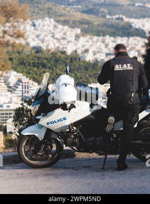 Hellenic Police, Greek police squad on duty riding bike and motorcycle ...