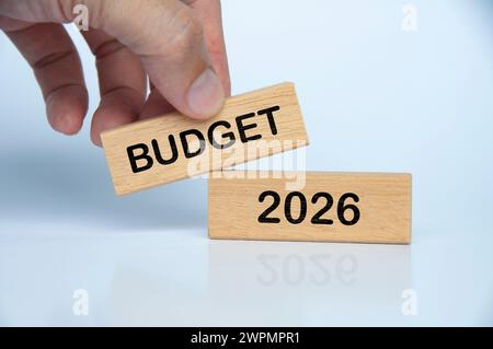 Budget 2026 text on wooden blocks with data analysis and office concept ...