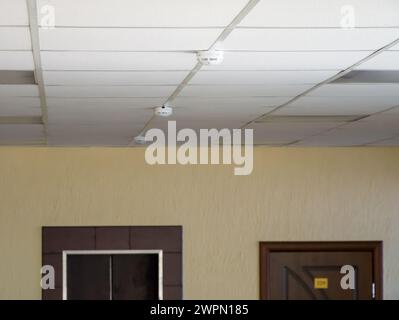 Fire alarm sensors on suspended ceiling Stock Photo - Alamy