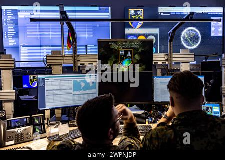 Uedem, Germany. 08th Mar, 2024. A Bundeswehr soldier sits in front of ...