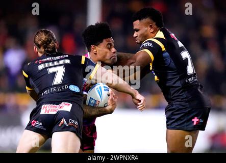 Castleford Tigers’ Sylvester Namo is tackled by Wigan Warriors’ Harry ...