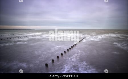 Groynes on the beach at Bridlington in Yorkshire protecting the ...
