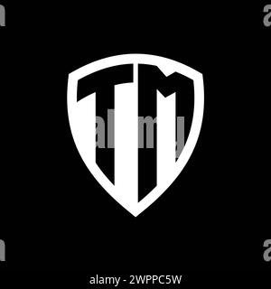 TM monogram logo with bold letters shield shape with black and white ...