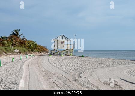 Lifeguard station above groomed beach sand at Crandon Park, Key ...