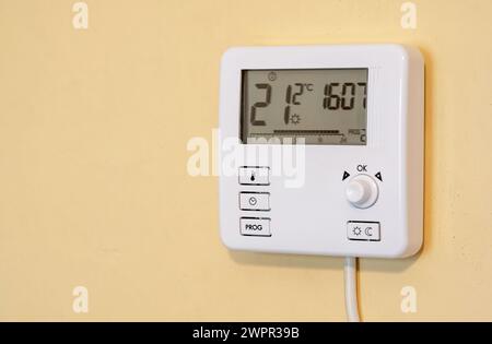 Thermostat on the wall, showing current temperature in the room Stock ...