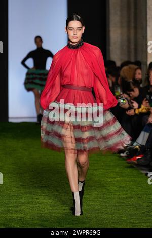 Lisbon, Portugal. 08th Mar, 2024. A model walks the runway during Dino ...