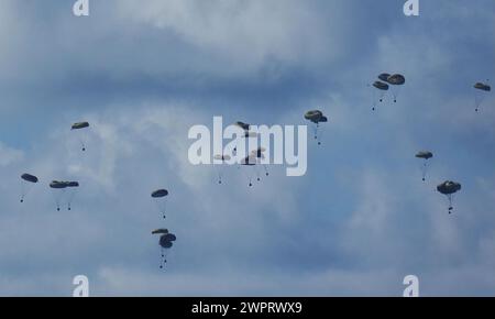 Parachutes drop supplies into the Gaza Strip as seen from southern ...