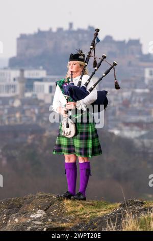 Scotland's National Piper Louise Marshall plays at The Kelpies in ...